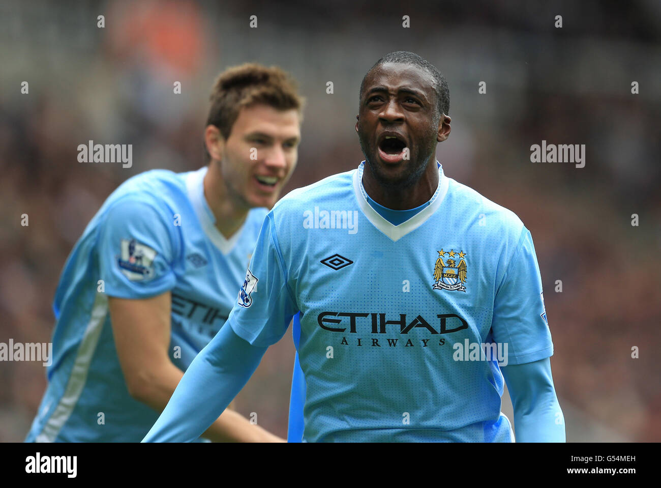 Manchester City's Yaya Toure celebrates scoring the first goal Stock ...