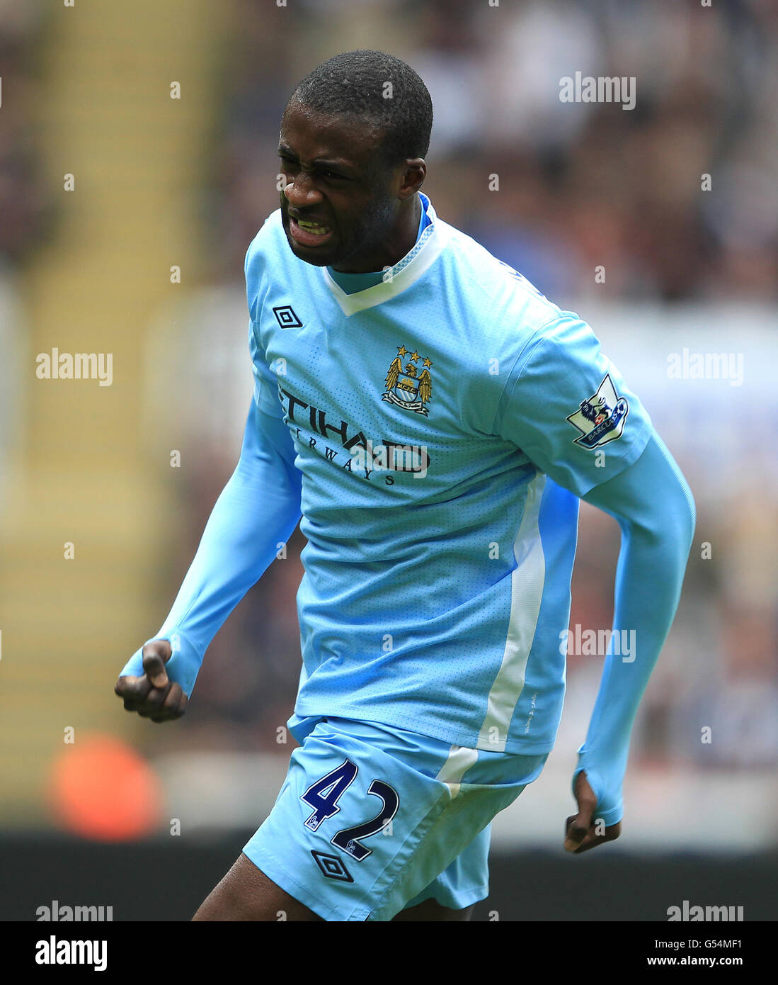 Manchester City's Yaya Toure celebrates scoring the first goal Stock ...