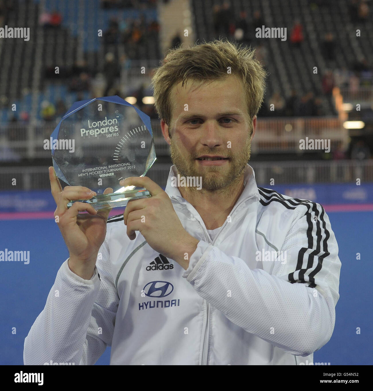 Germany captain Maximilian Mueller with the trophy after beating ...