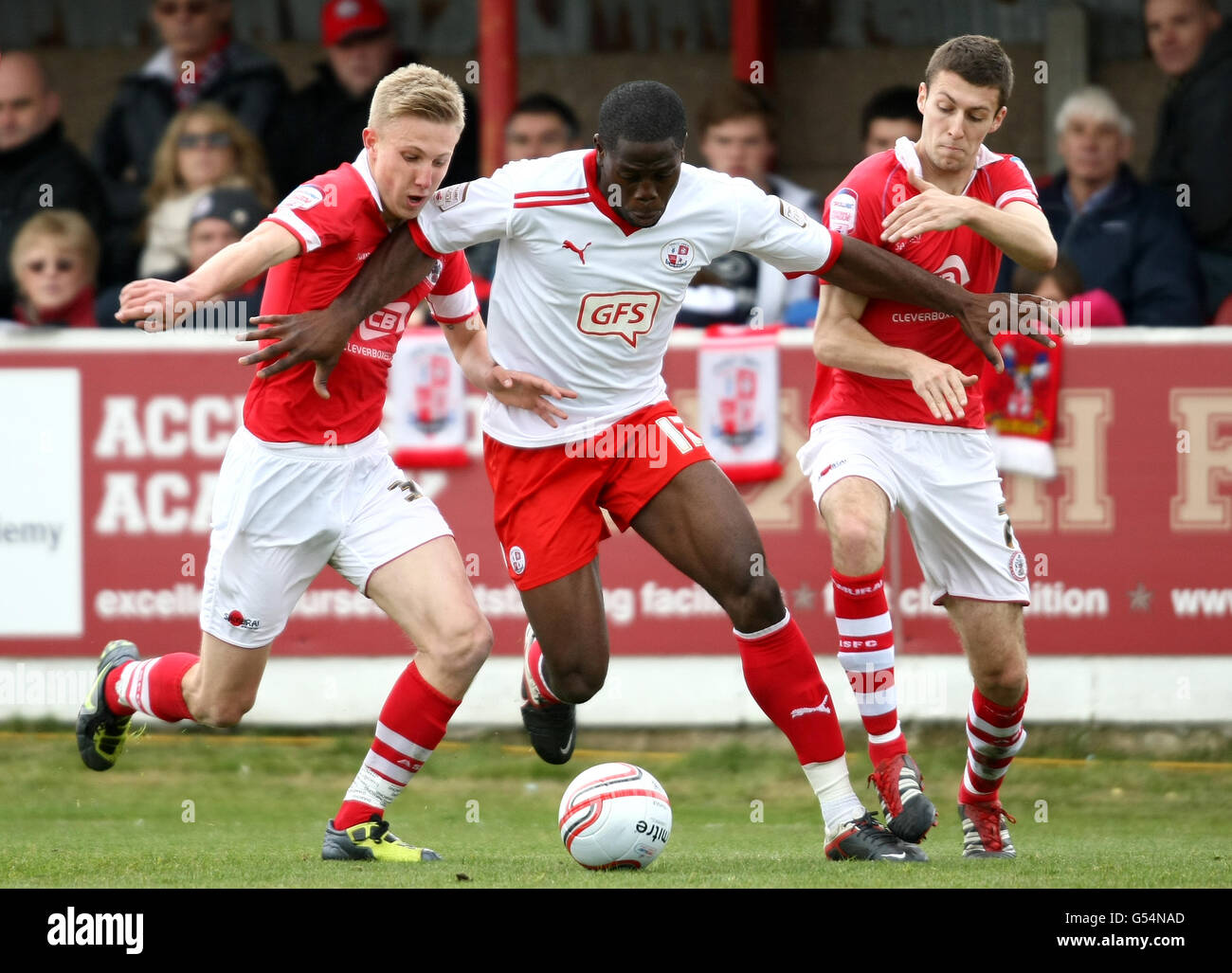 Accrington Stanley's Craig Linfield and Marcus Carver (left) battle for ...