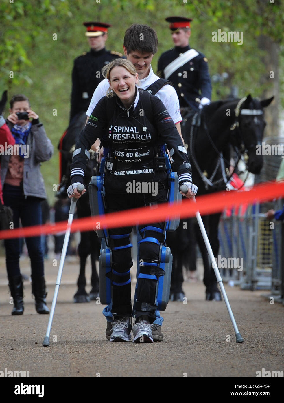 Claire Lomas, 32, who is paralysed from the chest down, wears a bionic ...
