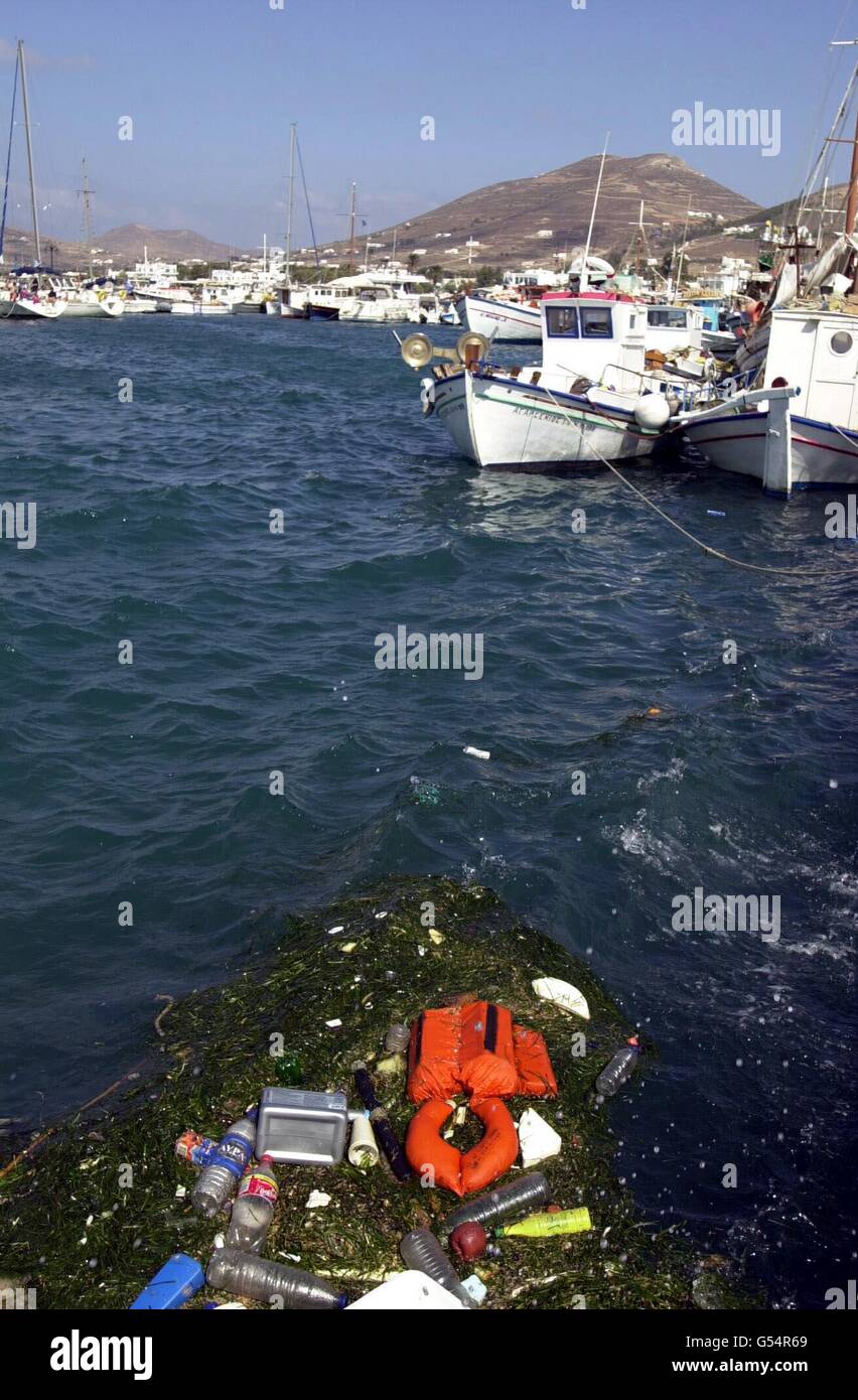 Debris and lifejacket washed up in the port of paros hi-res stock ...