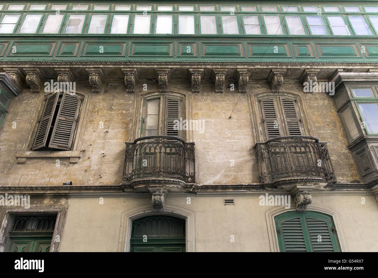 A street in Malta with typical Malta bay windows in Valletta, the ...