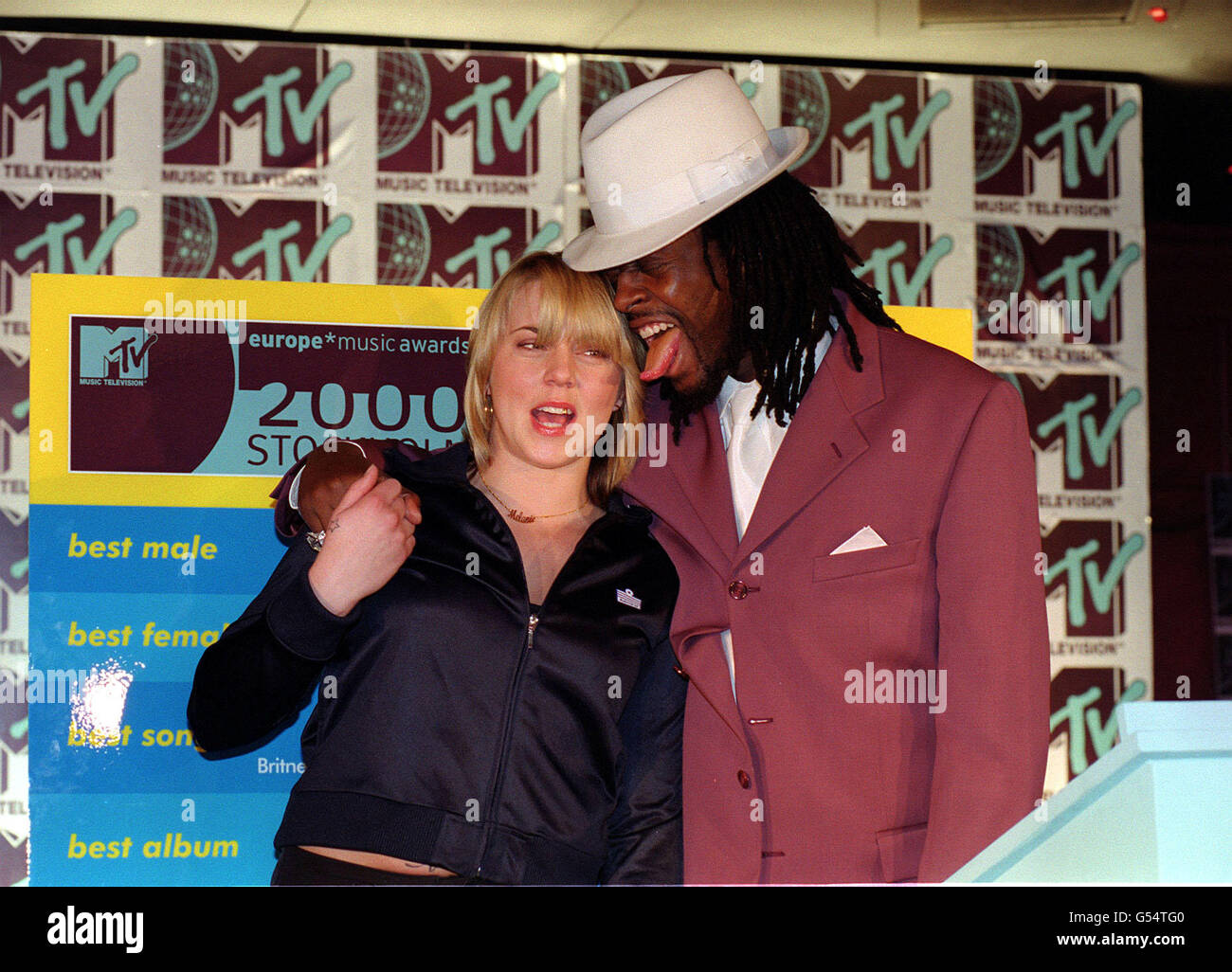 Musician Wyclef Jean, of The Fugees (R), and singer Melanie C, of girl ...