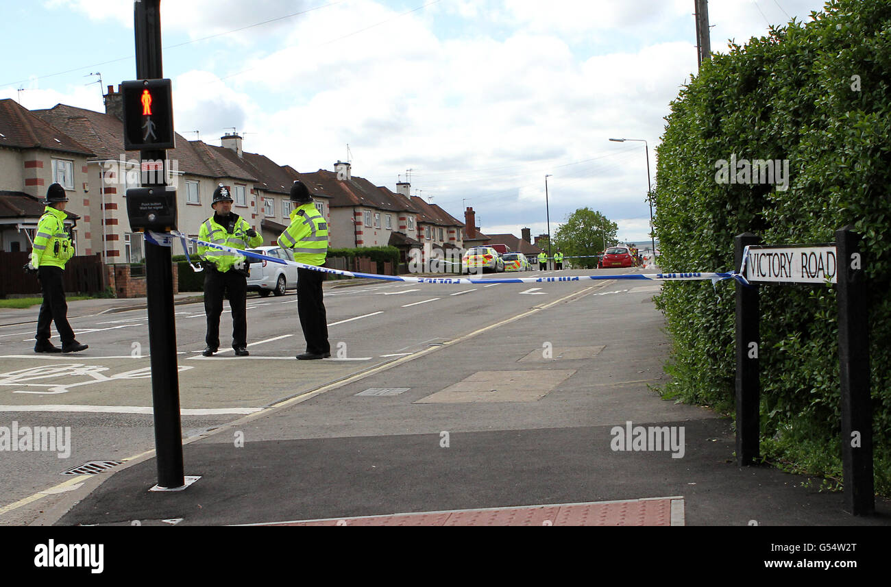 Police close roads near the scene in Allenton, Derby, after five ...