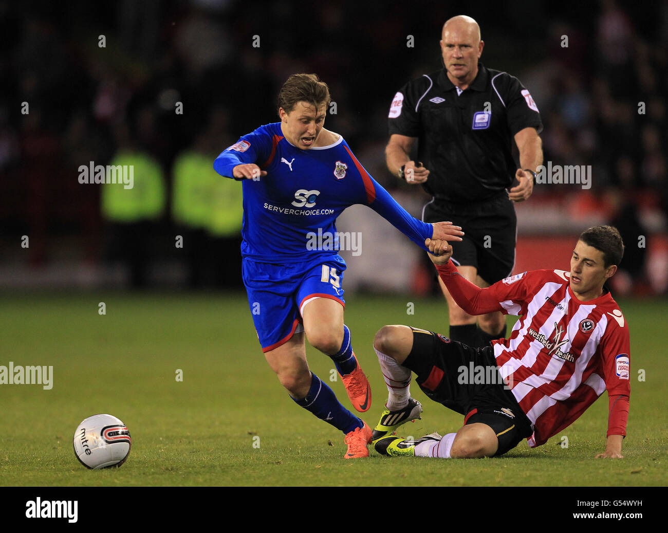 Sheffield United's Matt Lowton and Stevenage's Luke Freeman (left ...