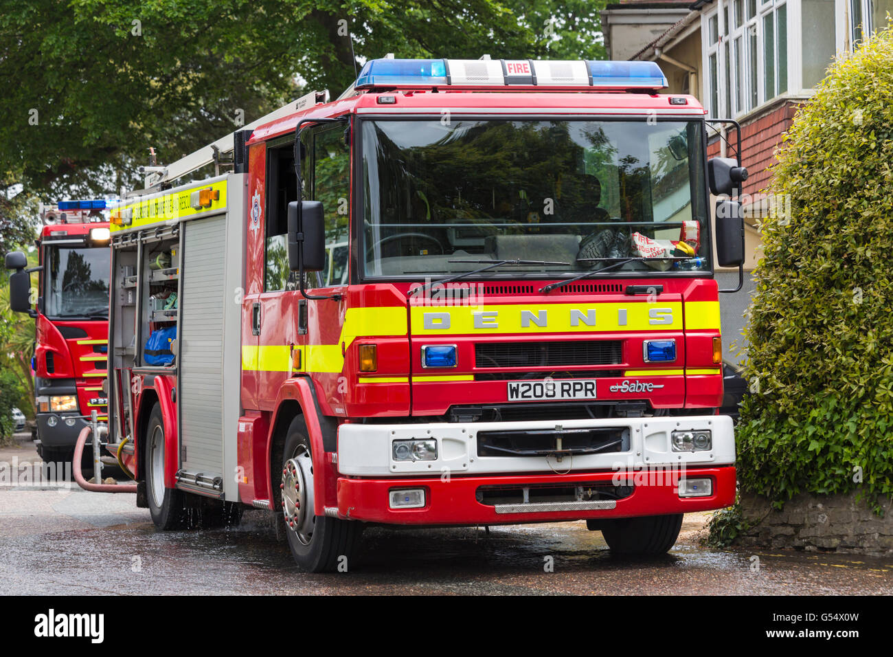 Fire engines, fire engine, parked outside building attending fire at ...