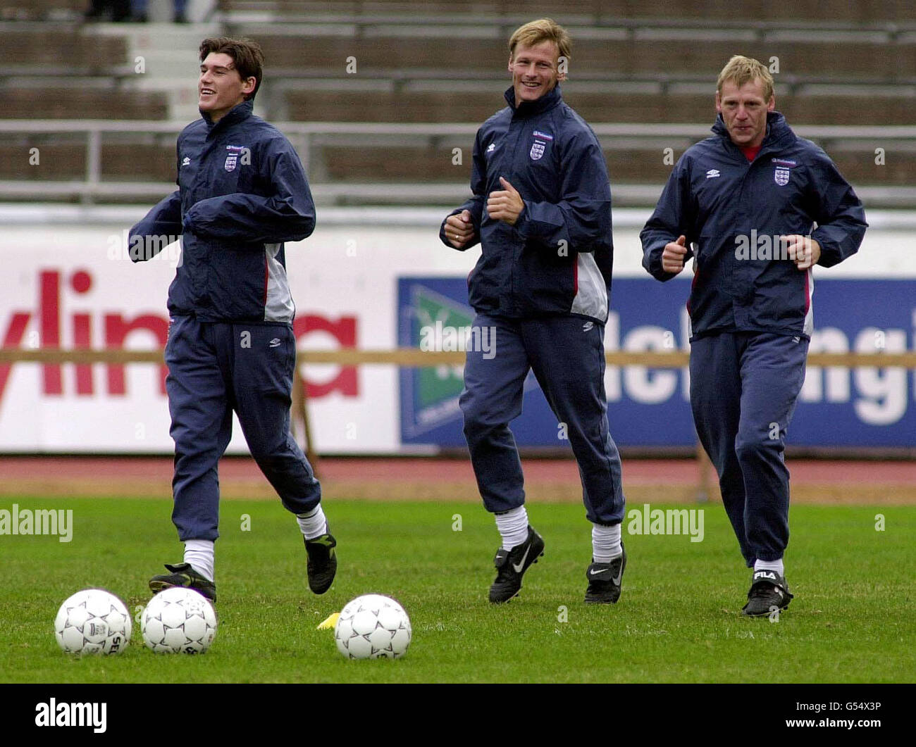 L-R: Gareth Barry, Teddy Sheringham and Stuart Pearce warming up during ...