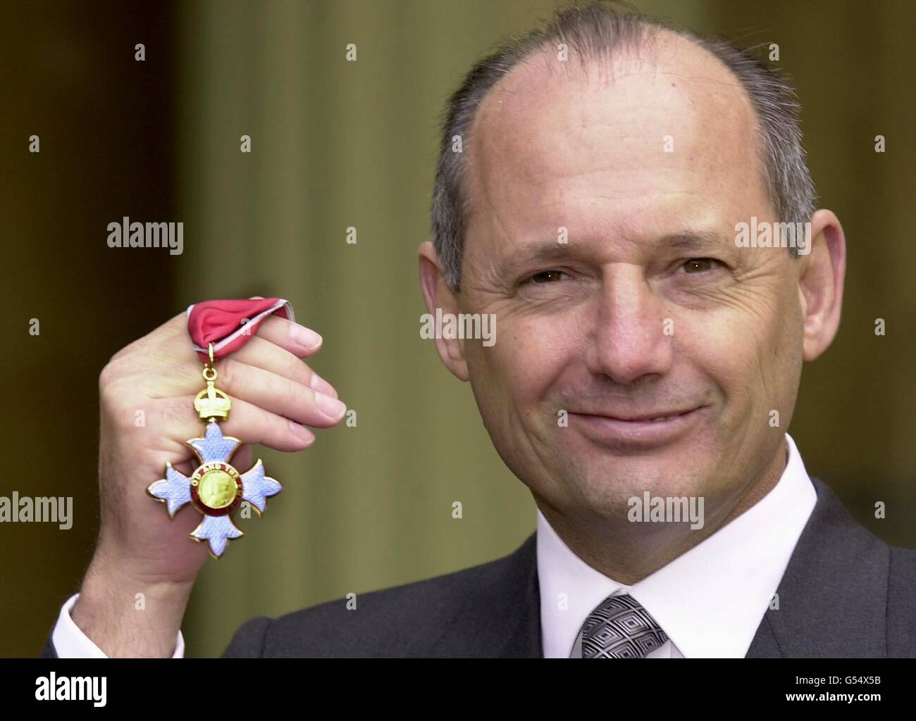 McLaren Formula One boss Ronald Dennis after receiving his CBE ...
