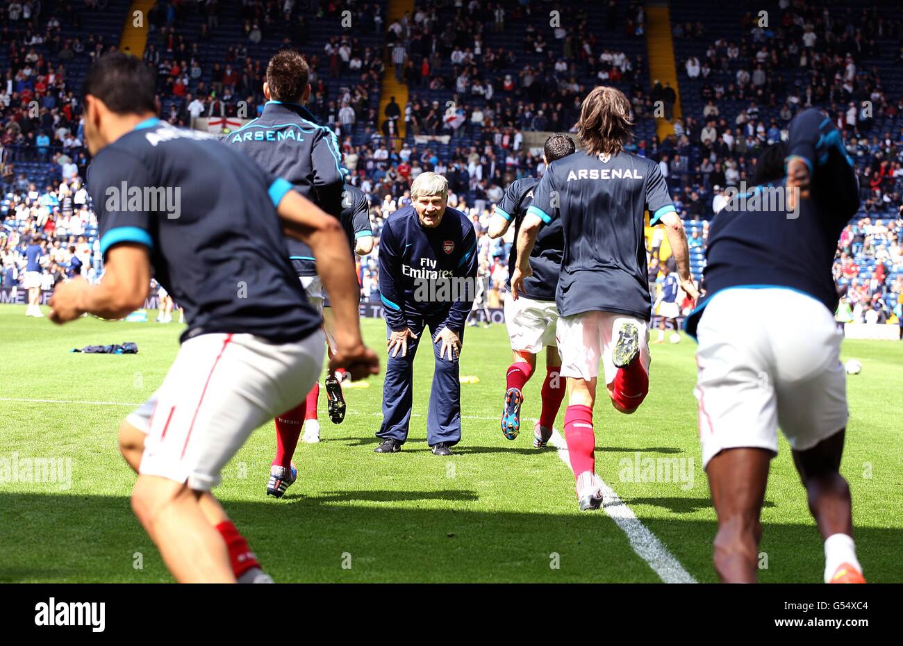 Arsenal assistant manager Pat Rice (centre) during the warm-up before ...