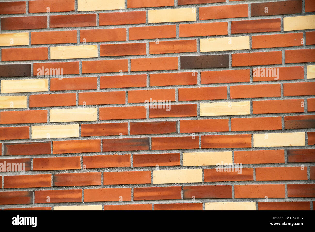 Closeup background image of bricks in different colors in random ...