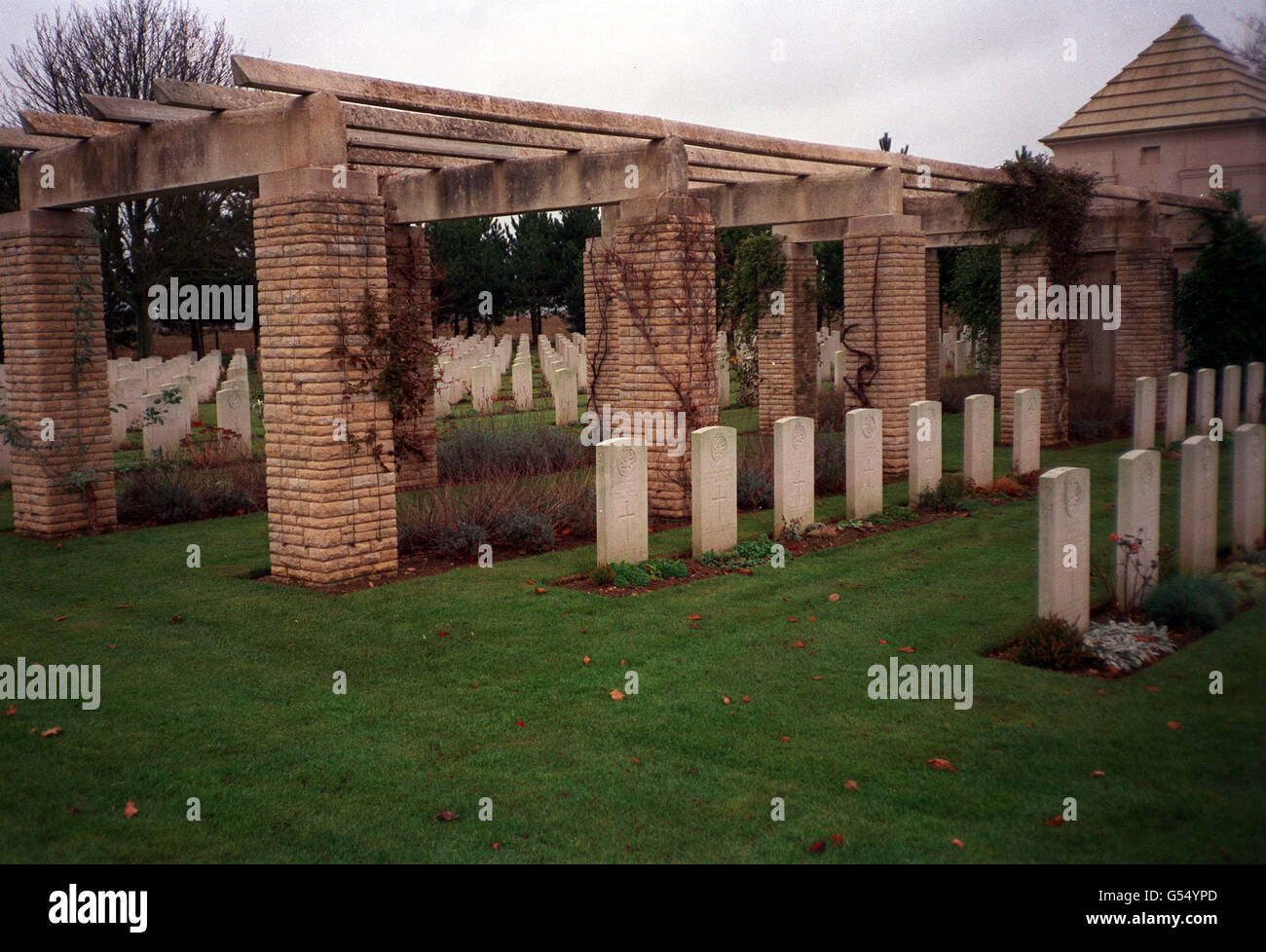 Pergola separates graves at british military cemetery in normandy hi ...