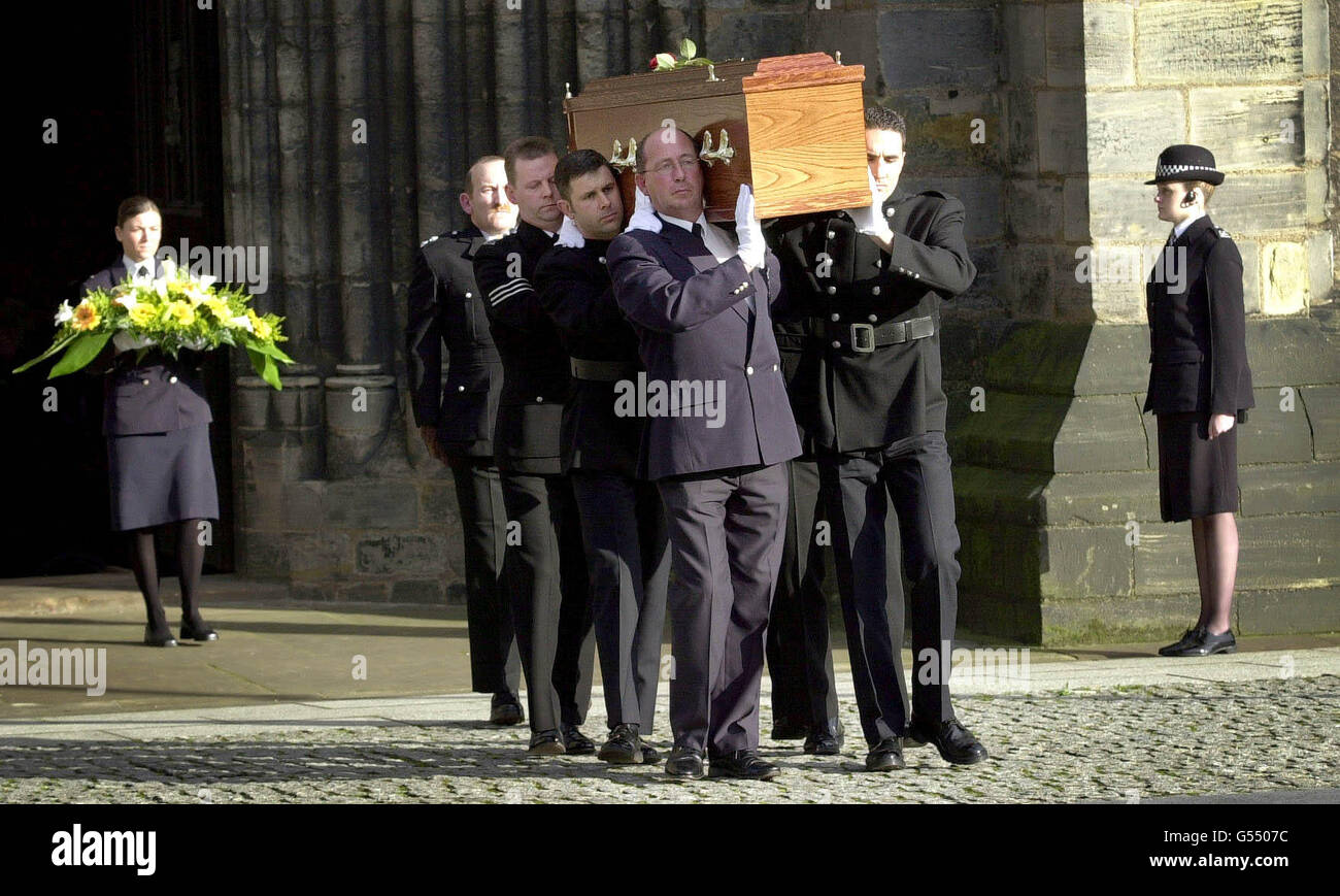 The coffin of the late Scottish First Minister Donald Dewar is carried ...