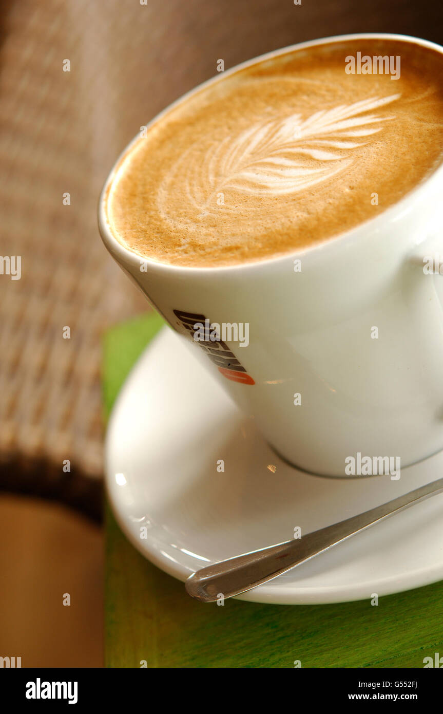 Cup of Coffee with maple leaf motif in the froth Stock Photo - Alamy