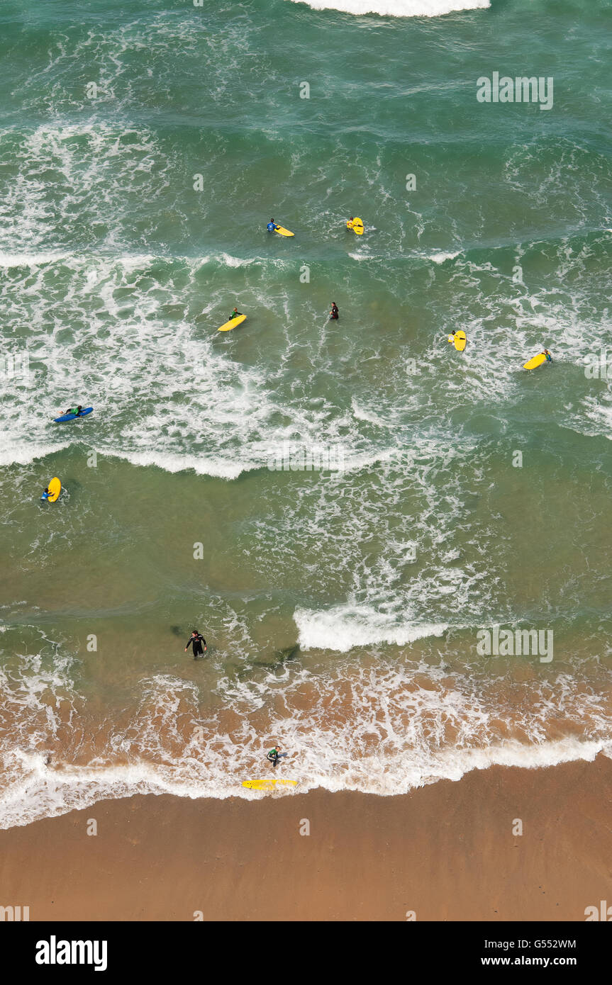Overhead view of surfers in the water Stock Photo - Alamy
