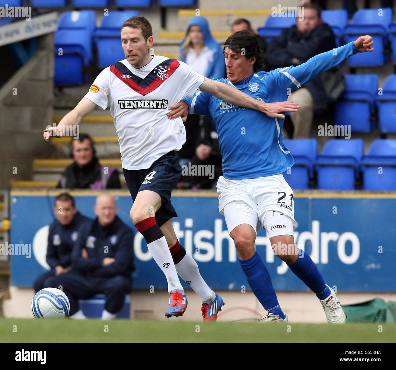 Rangers Kirk Broadfoot holds off St Johnstone's Francisco Sandaza ...