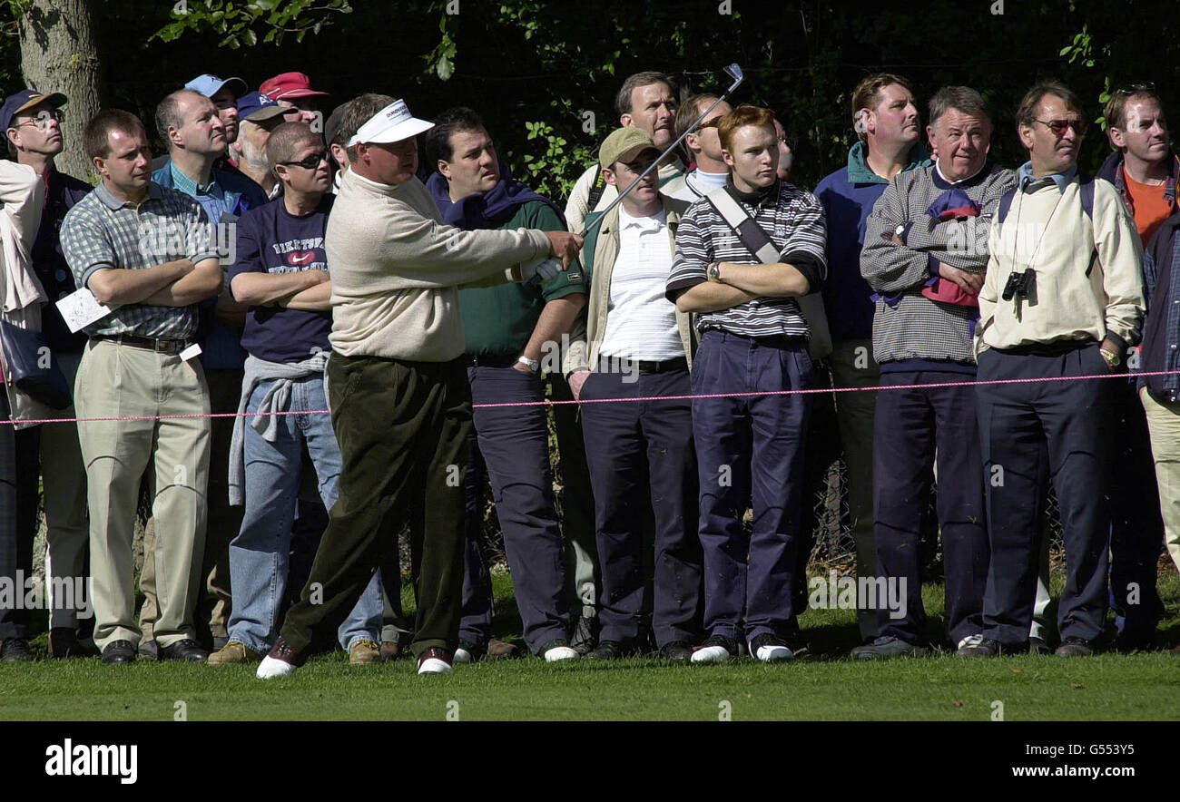 Darren Clarke from Northern Ireland plays a shot close to the crowd on ...