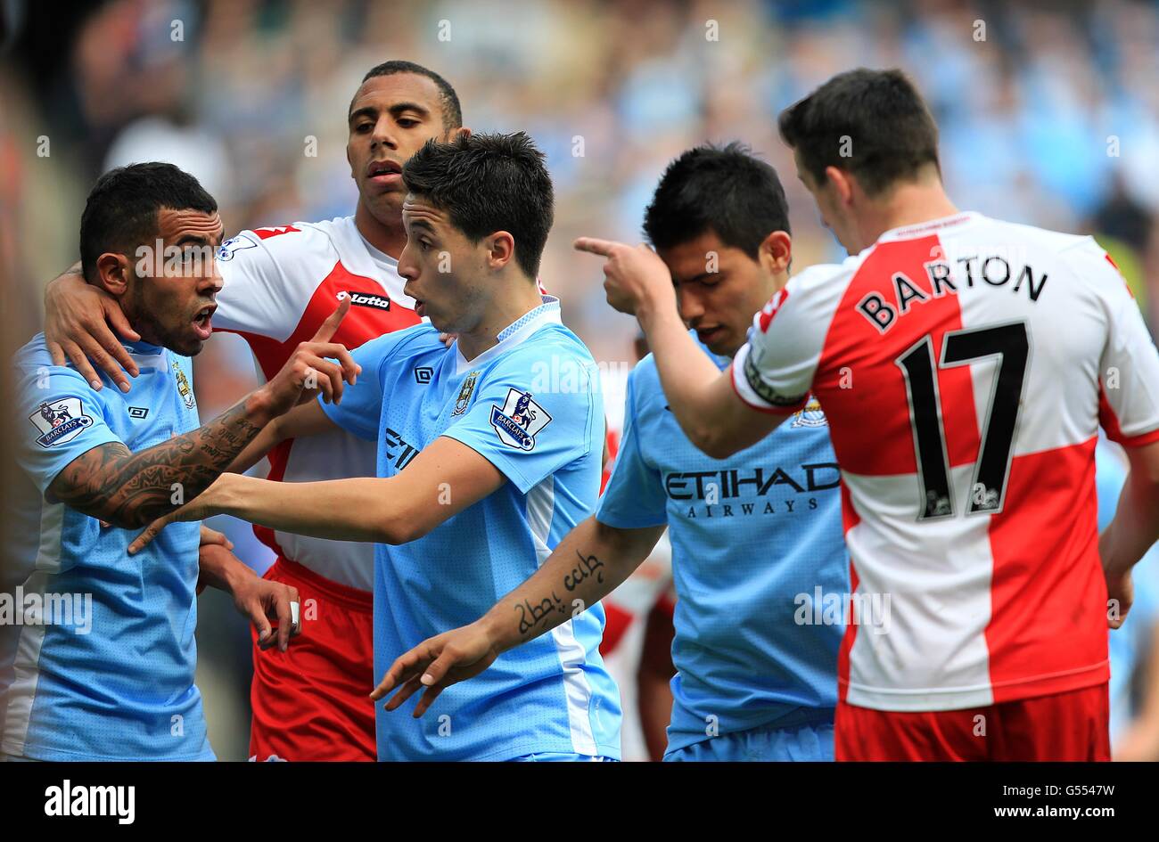 Manchester citys carlos tevez queens park rangers joey clash hi-res ...