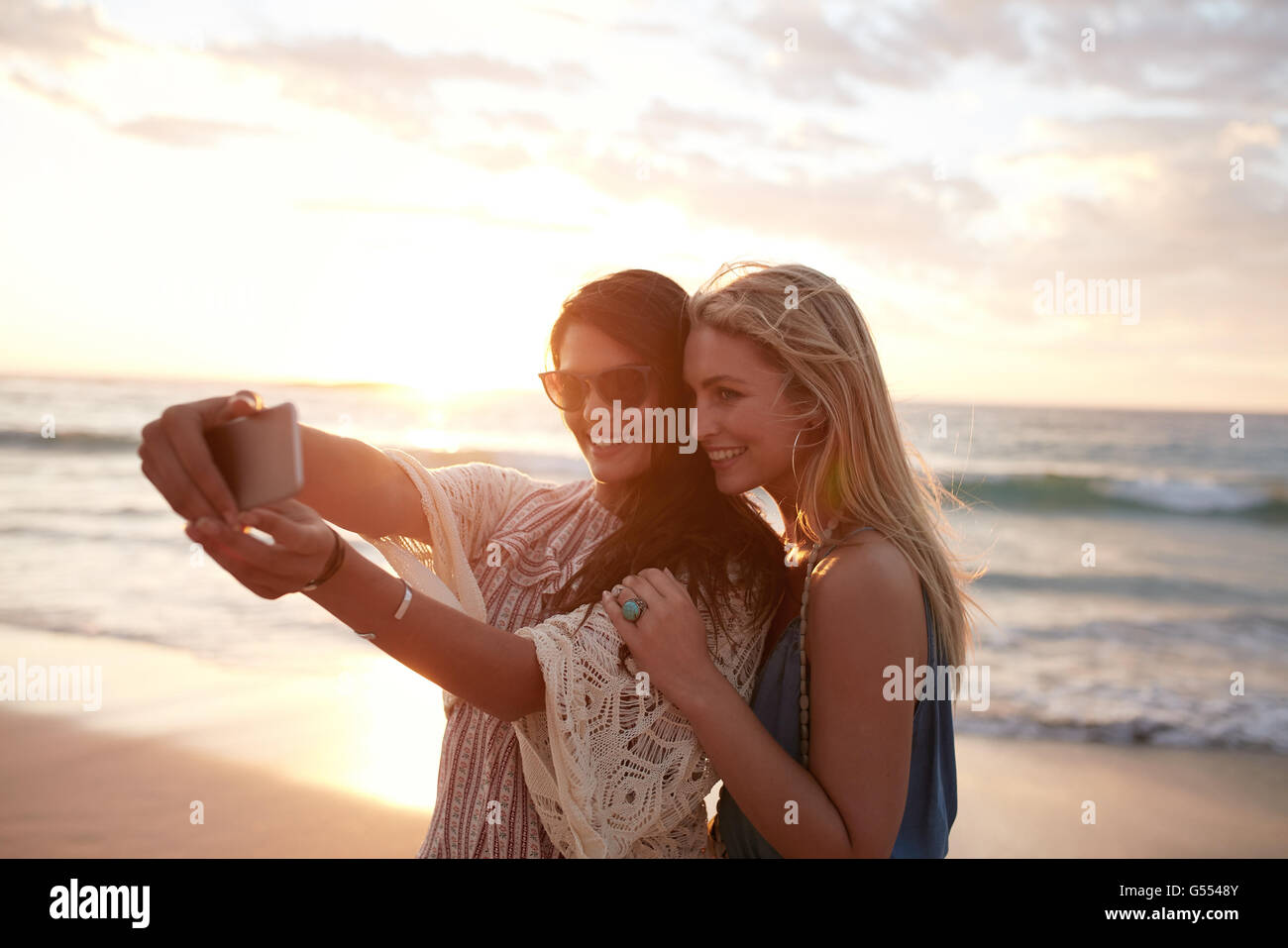 Two women at the beach two women at the beach hi-res stock photography ...
