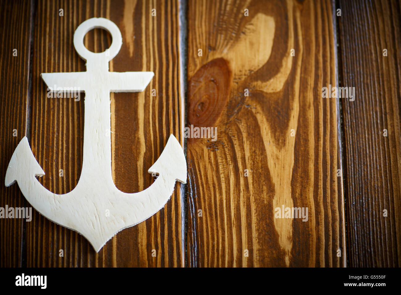 Wooden nautical anchor Stock Photo - Alamy