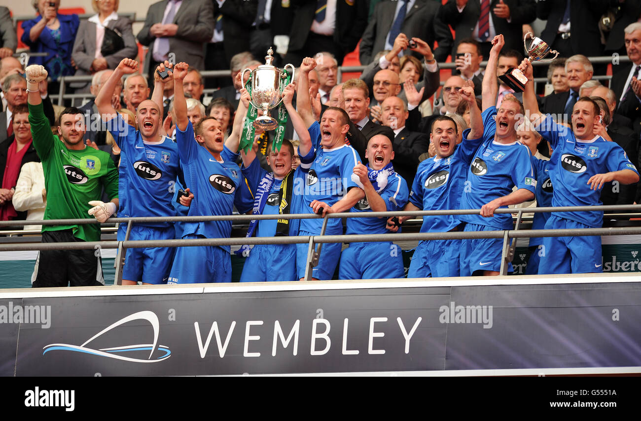 Dunston UTS captain Ben Cattanach celebrates with his team mates as he ...