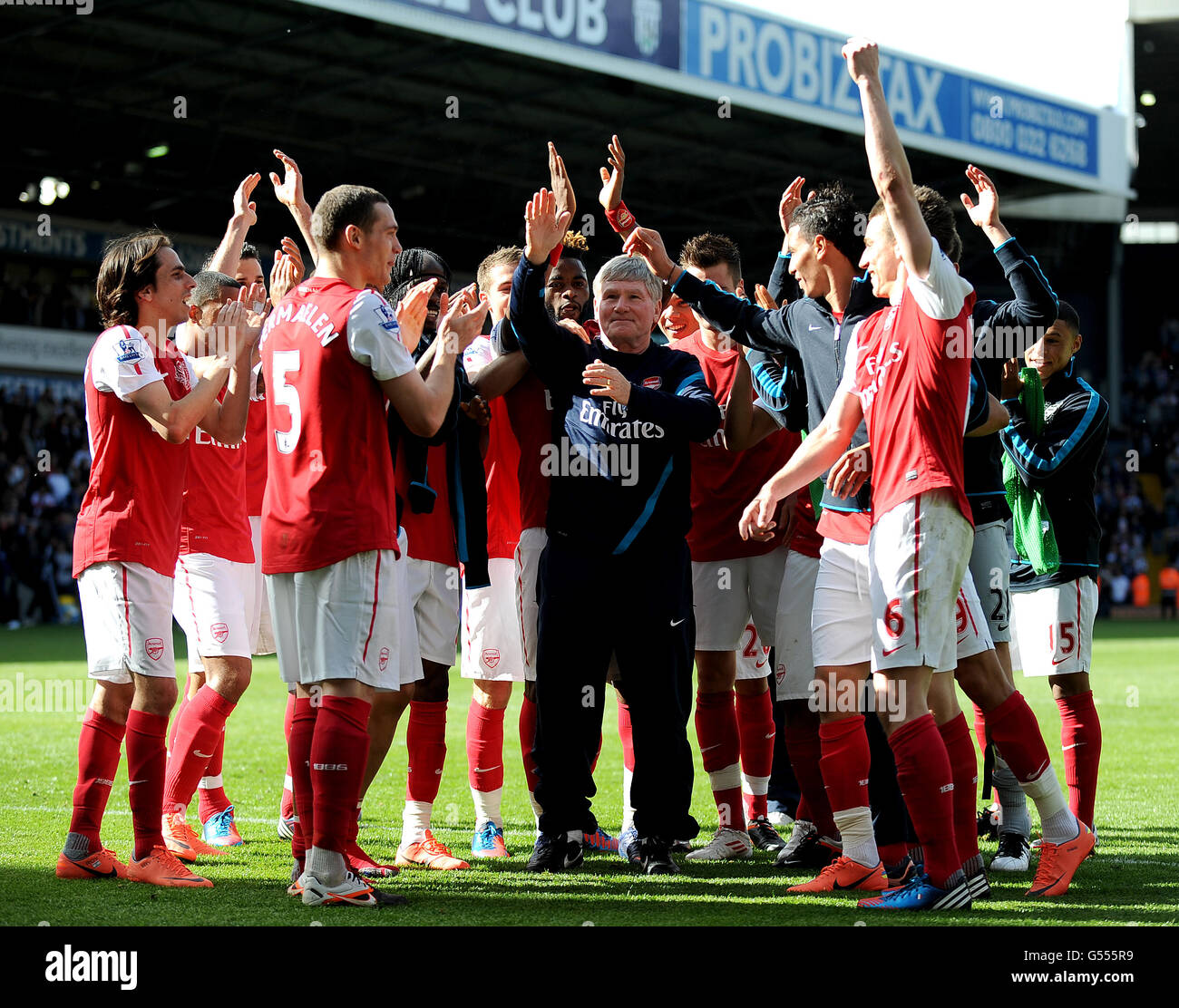 Arsenal's Assistant Manager, Pat Rice waves goodbye to the traveling ...