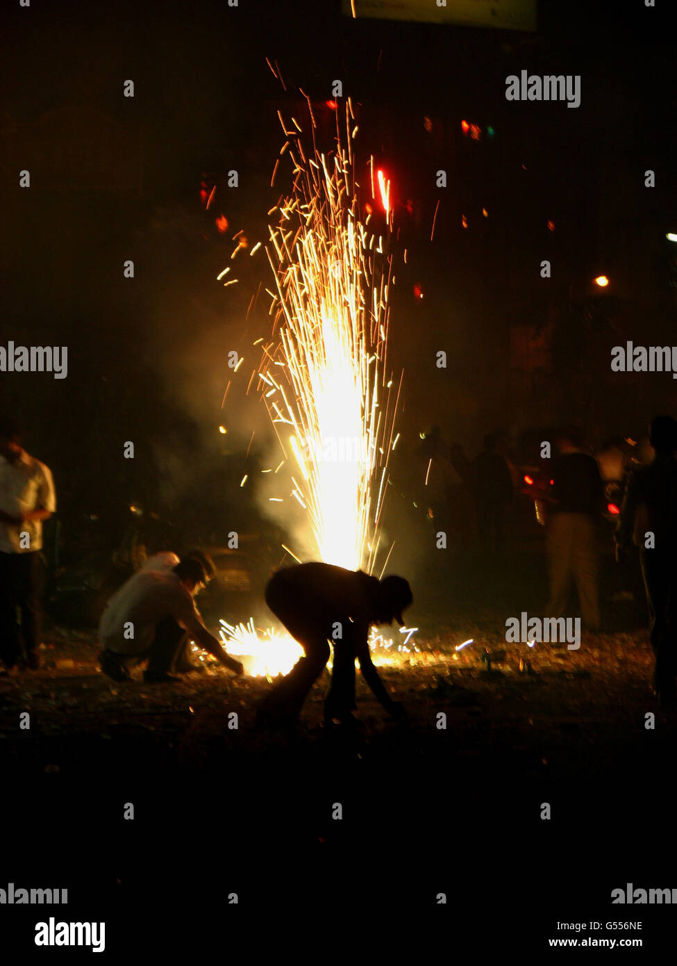 People enjoying fireworks during Diwali festival in India Stock Photo ...