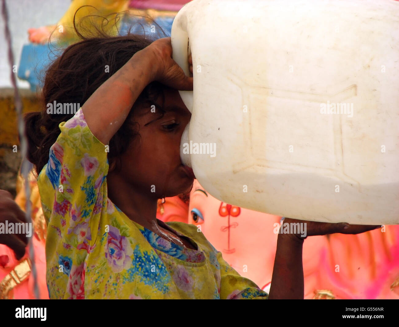 Poor child drinking water hi-res stock photography and images - Alamy