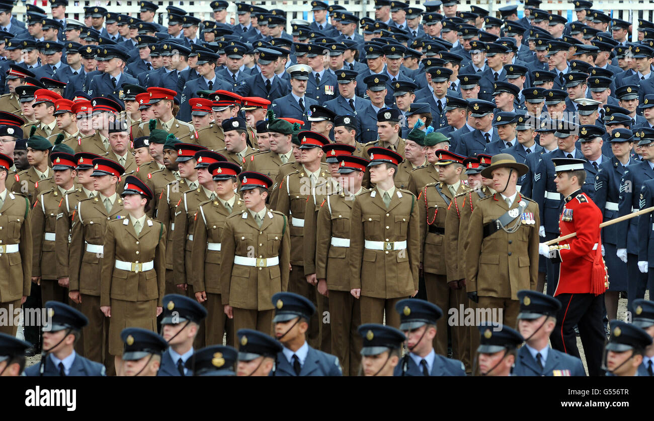 Members of the armed forces line up in formation during the Queen's ...