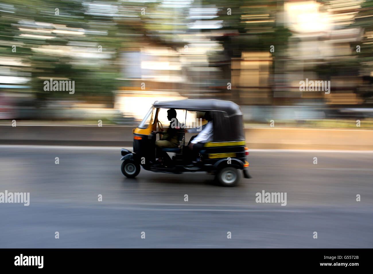 A speeding rickshaw on an Indian road Stock Photo - Alamy