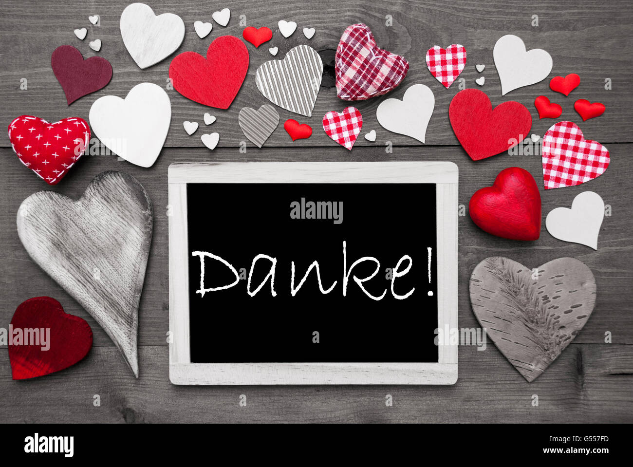 Chalkbord With Many Red Hearts, Danke Means Thank You Stock Photo - Alamy