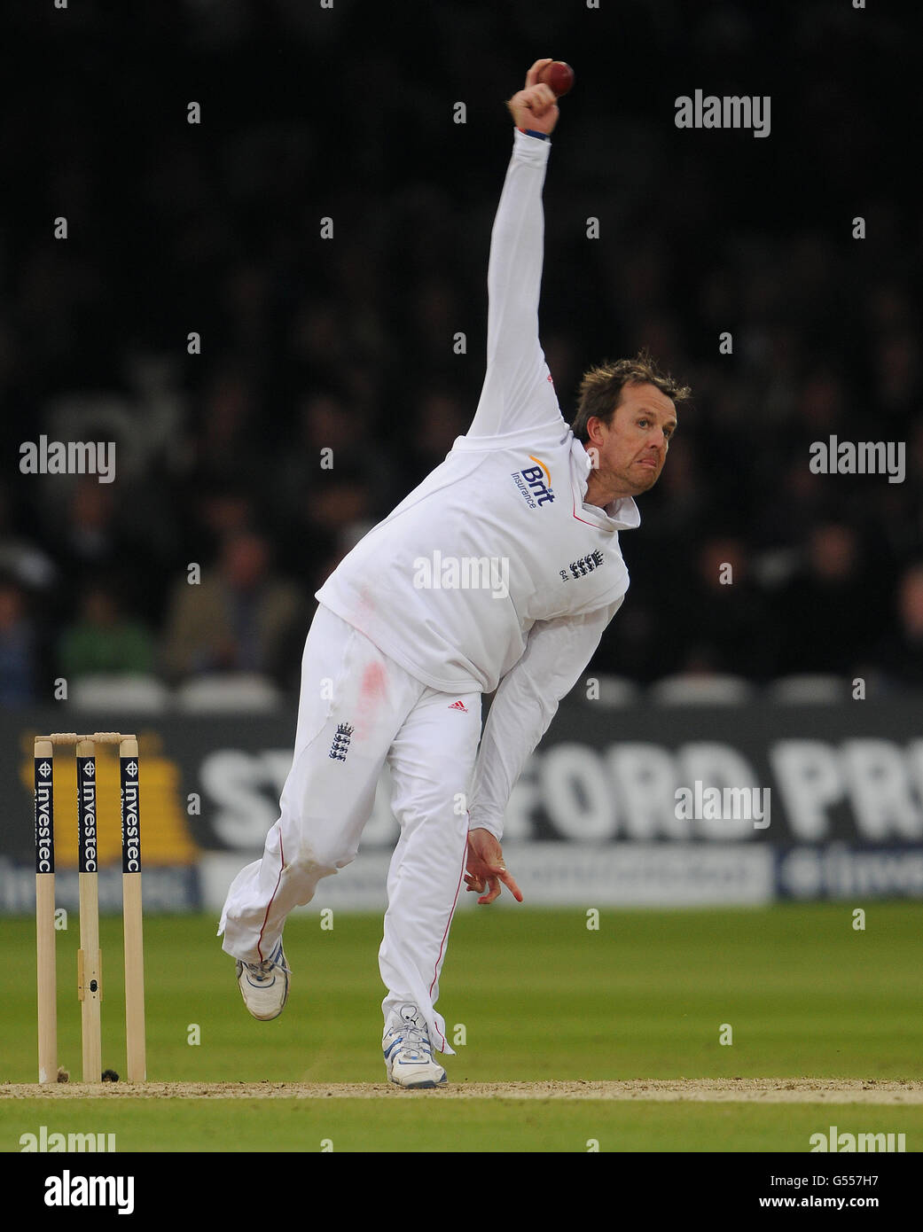 England's Graeme Swann in bowling action against the West Indies Stock ...