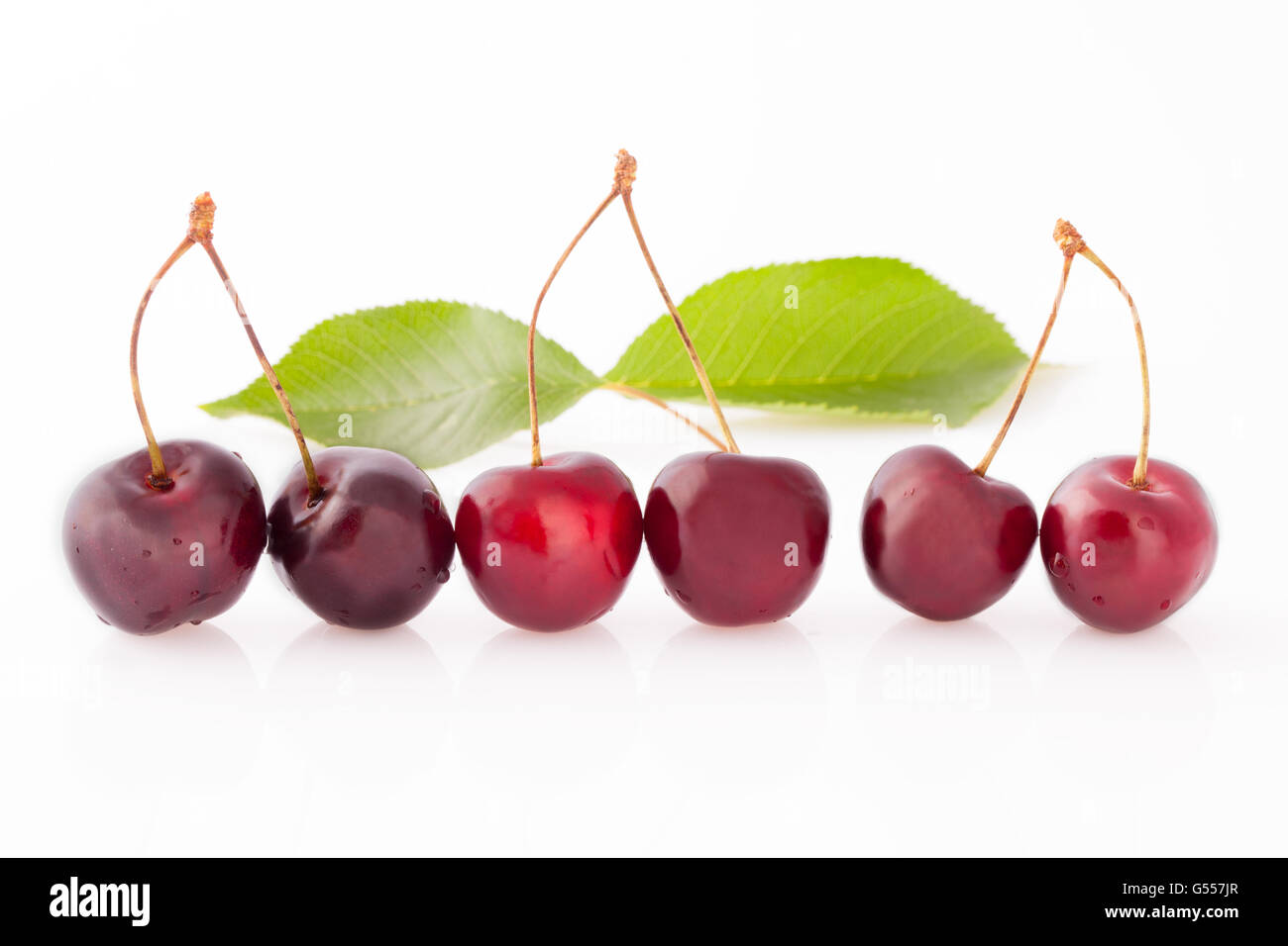 Ripe Cherries In Row Stock Photo - Alamy