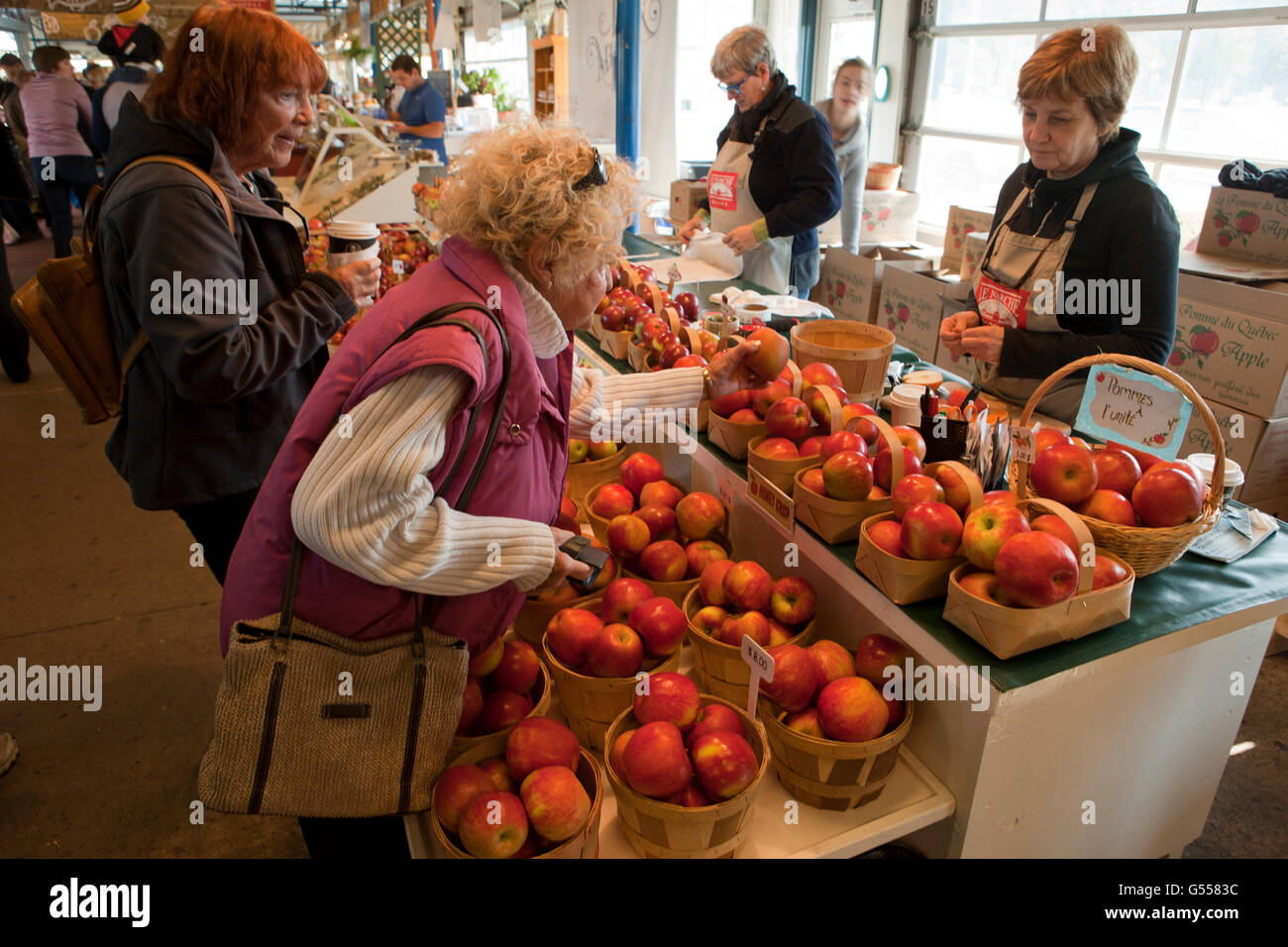 Apple seller and customers in food market, Old Port area (Vieux-Port ...