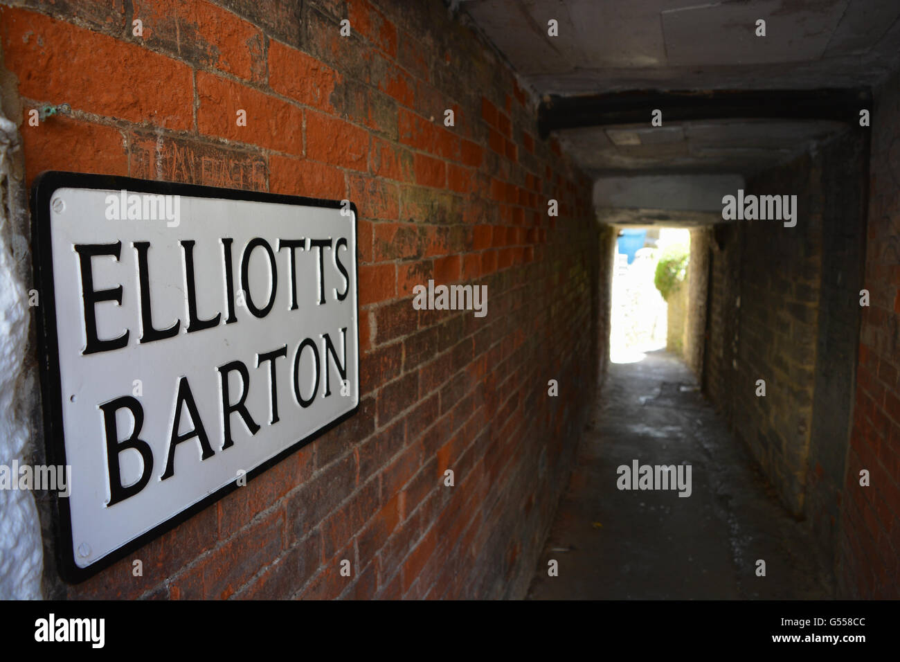 Elliotts Barton, open passageway under heavy timber beam, from High ...