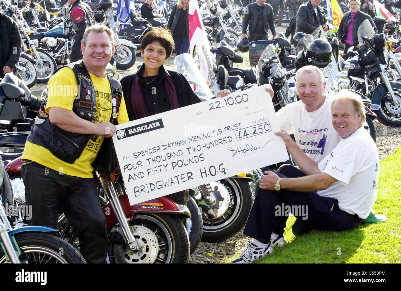 Sponsored walkers Steve Dayman (far right) and Steve Fear (second from ...