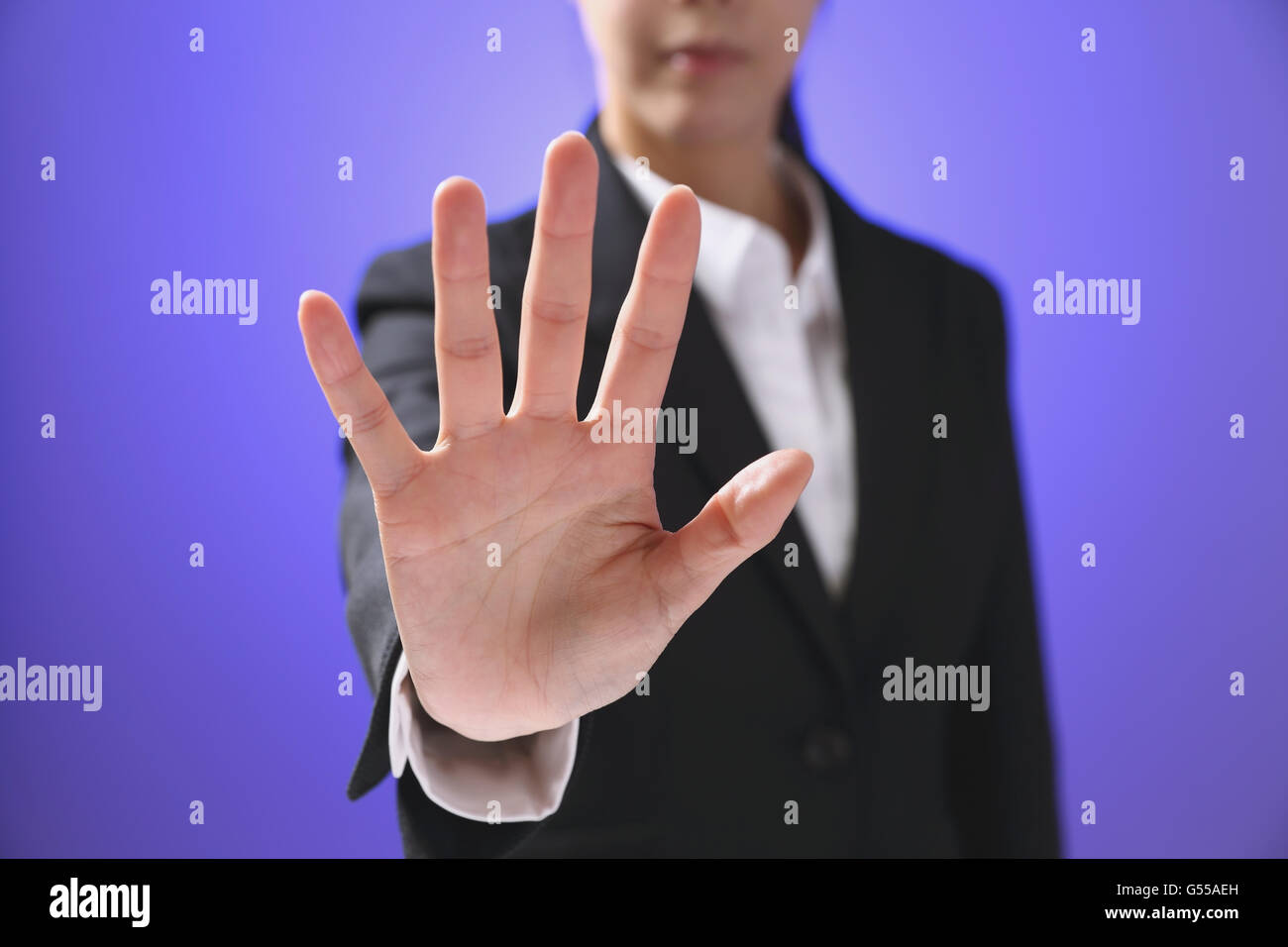 Japanese woman performing touch gesture Stock Photo - Alamy