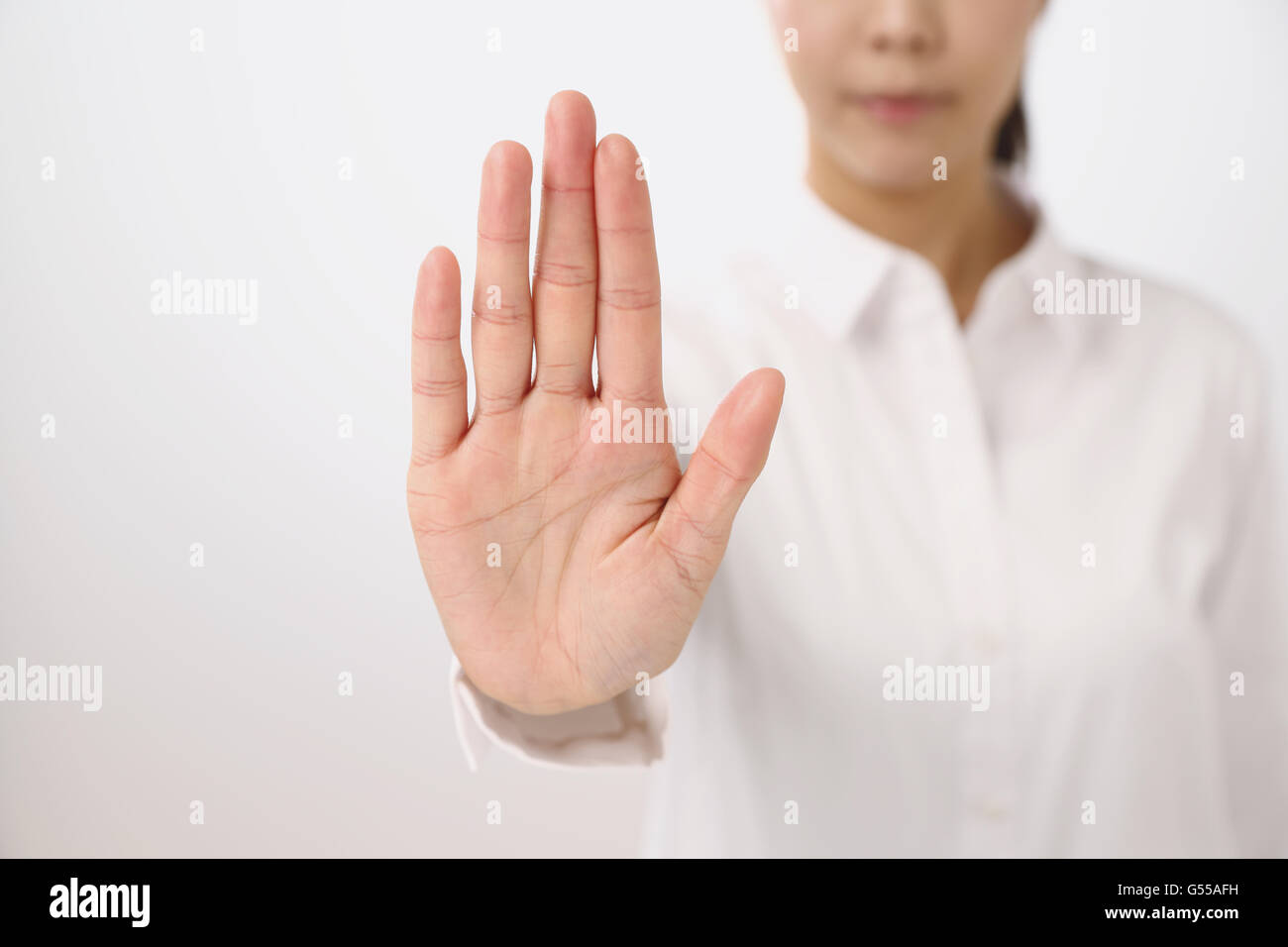 Japanese woman performing touch gesture Stock Photo - Alamy