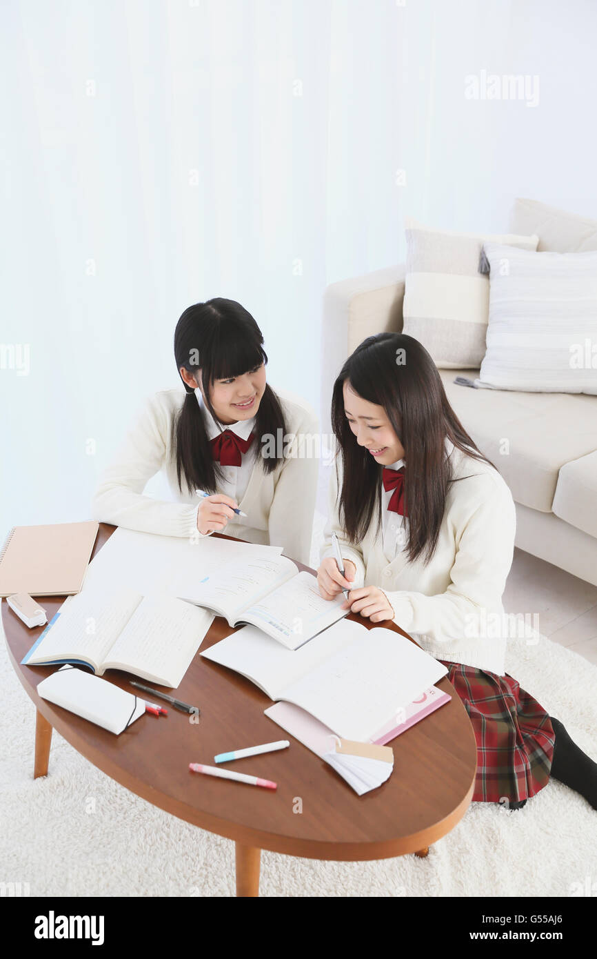 Japanese High-school students in uniform studying together Stock Photo ...