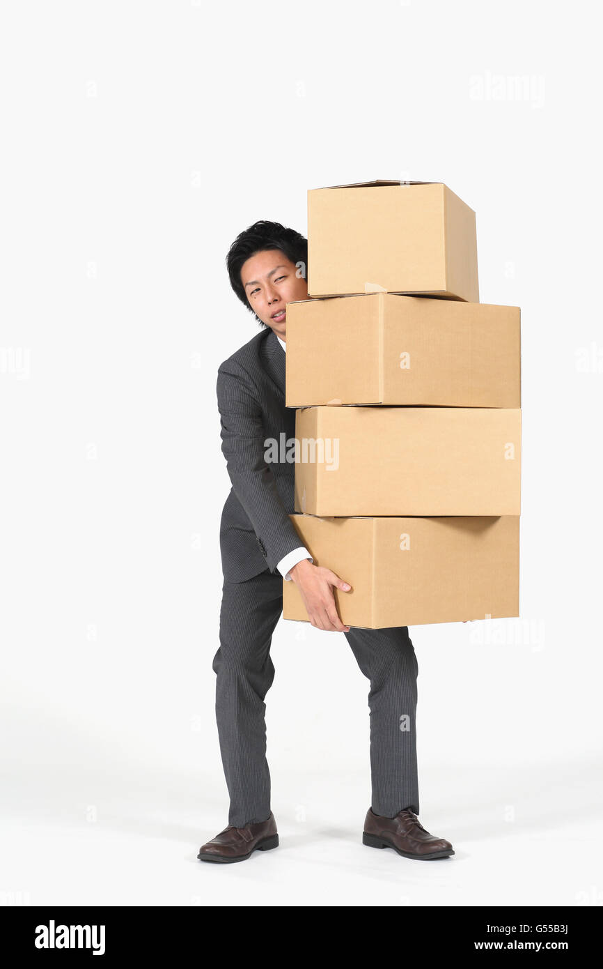 Carrying boxes hi-res stock photography and images - Alamy