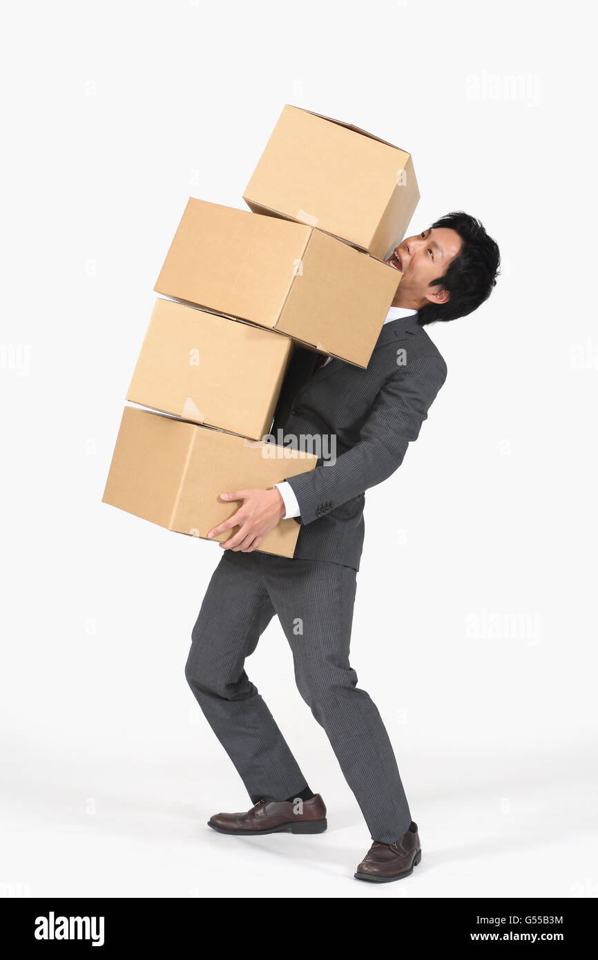 Carrying boxes hi-res stock photography and images - Alamy