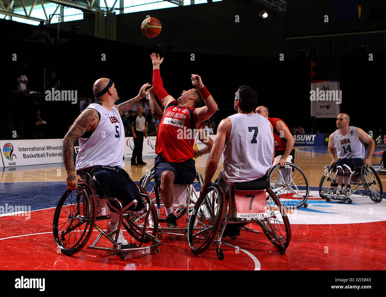 Great Britain's Simon Munn shoots under pressure from the USA defence ...