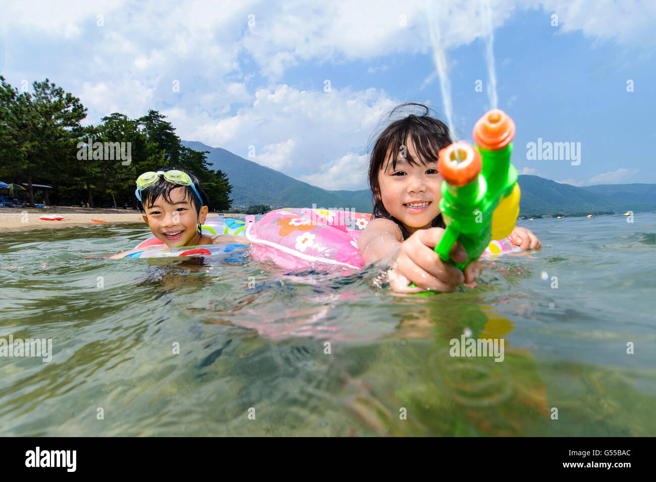 Kids swim beach hi-res stock photography and images - Alamy