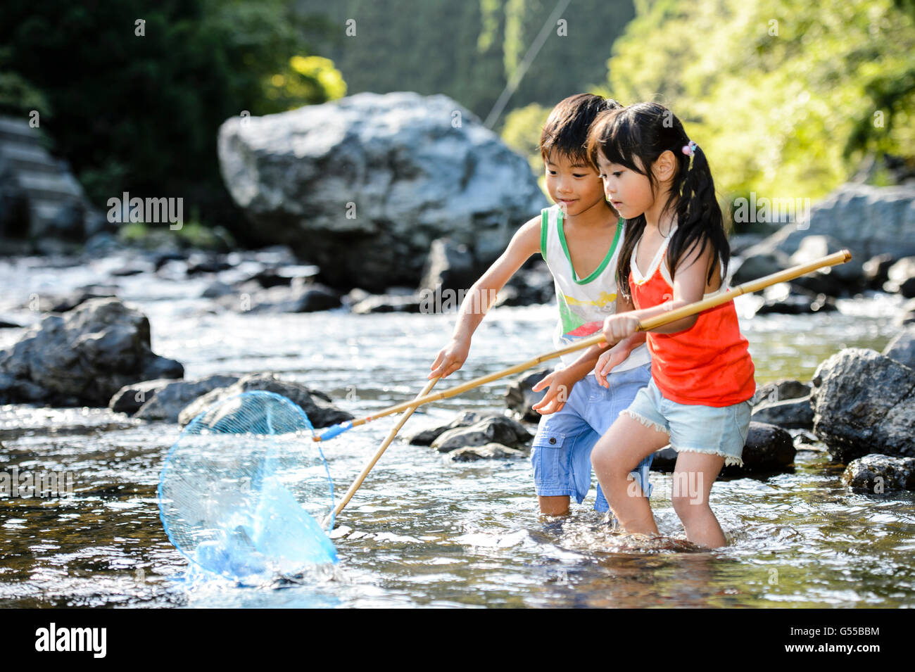 Children playing by river hi-res stock photography and images - Alamy