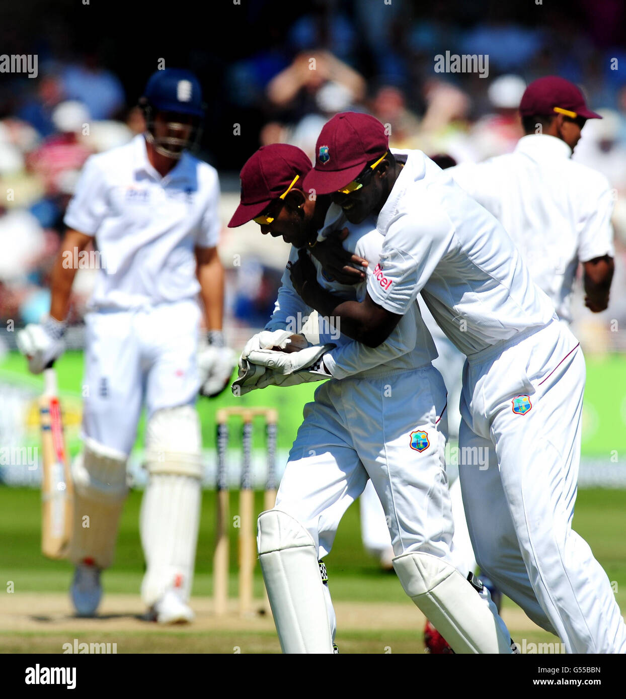 West Indies Darren Sammy (right) and Denesh Ramdin celebrate the wicket ...