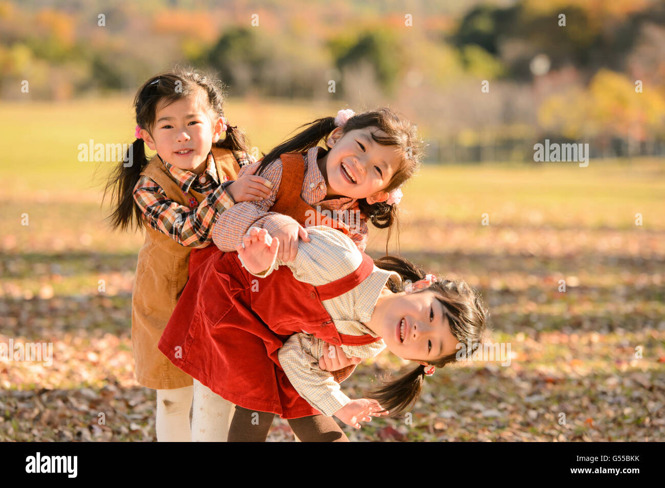 Children playing in urban park hi-res stock photography and images - Alamy