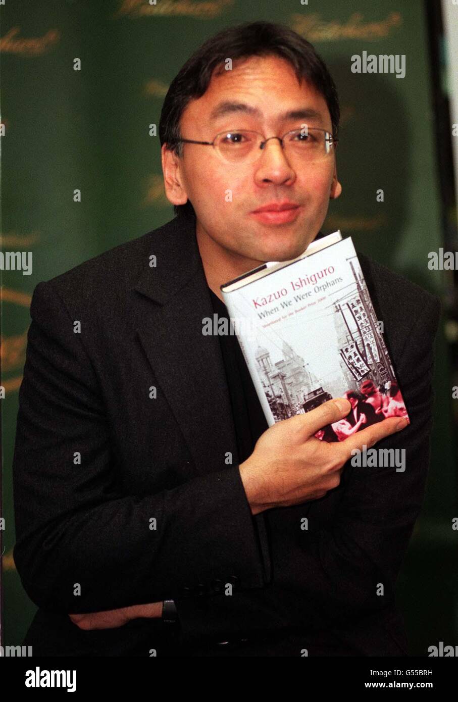 Author Kazuo Ishiguro with his book When We Were Orphans at Hatchards ...