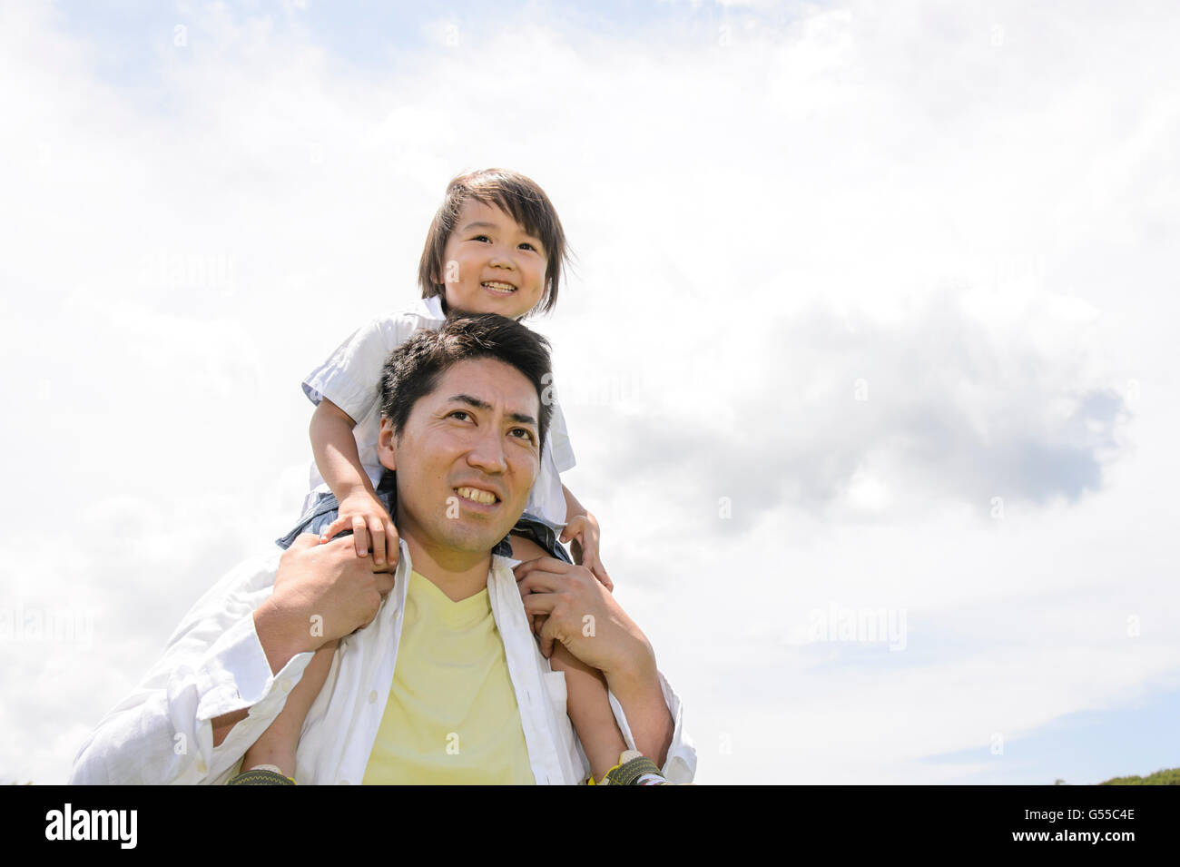 Kid with dad at the park Stock Photo - Alamy