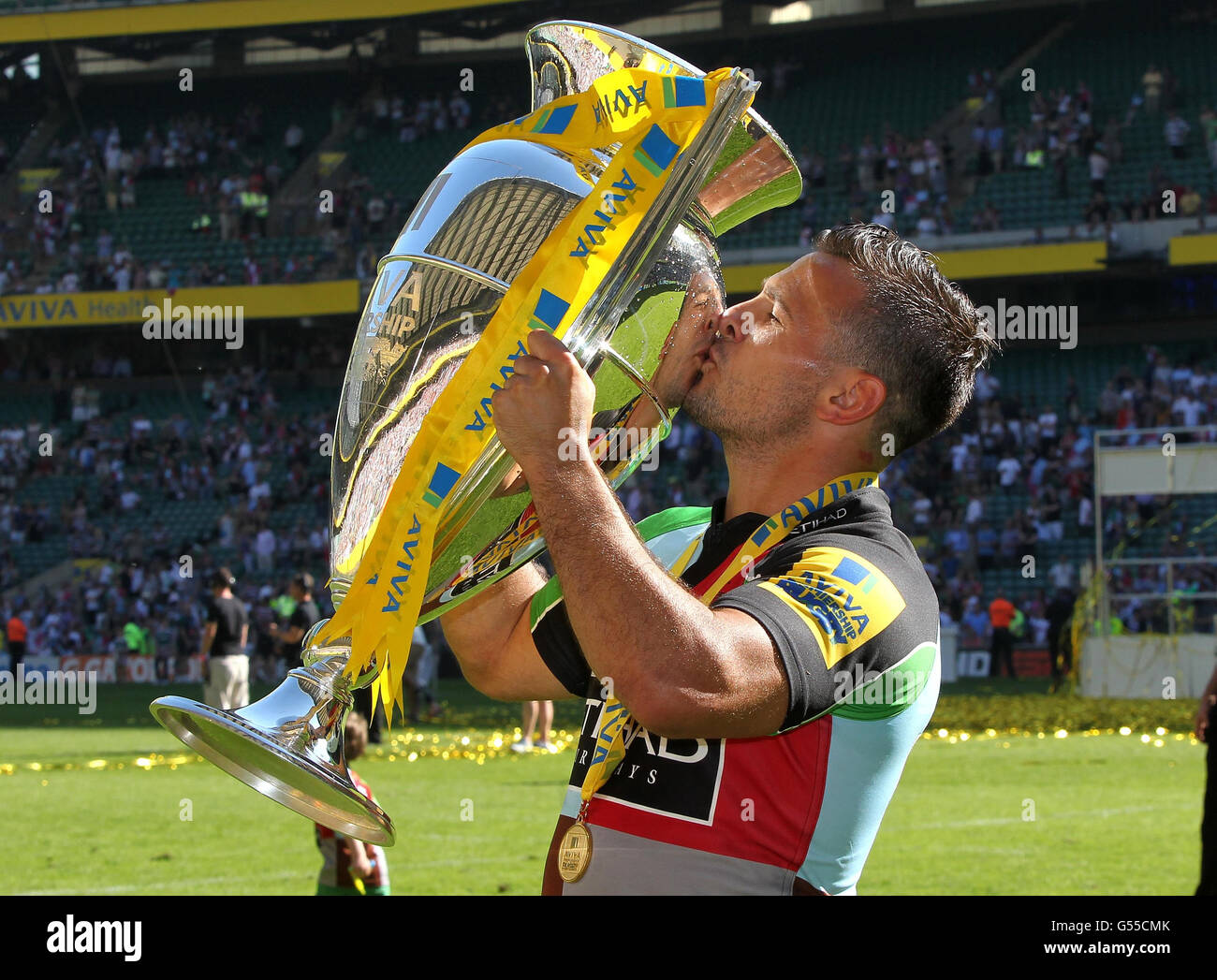 Harlequins Danny Care celebrates with the trophy after victory over ...