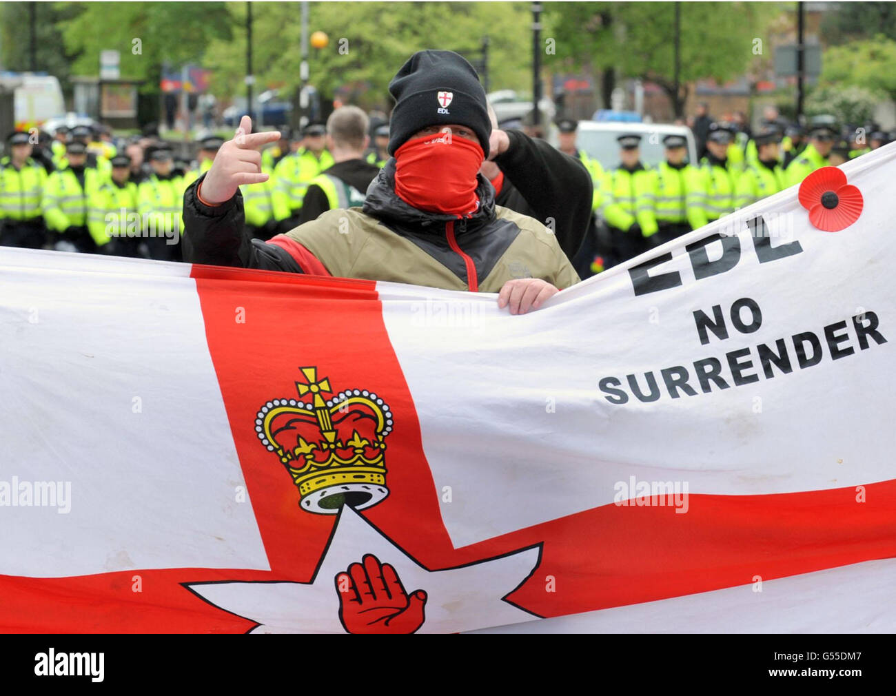 An EDL supporter in central Luton as a heavy police presence separated ...